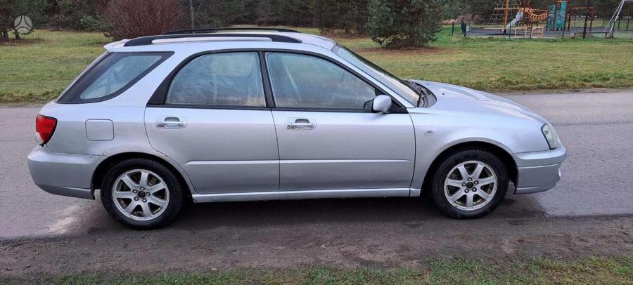 Grey Subaru Impreza 2003 in Vilnius, with an engine capacity of 1.99 L and mileage of 309 thousand km for 2500 €, photo 5 on AUTOMOTO.COM.LV