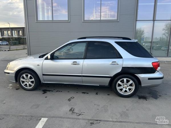 Grey Subaru Impreza 2003 in Vilnius, with an engine capacity of 2.00 L and mileage of 219 thousand km for 1400 €, photo 4 on AUTOMOTO.COM.LV