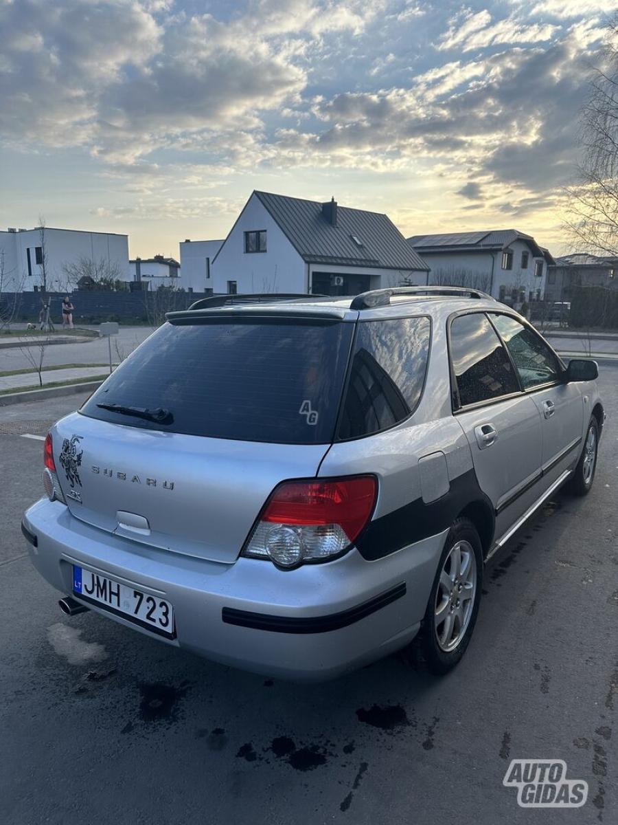 Grey Subaru Impreza 2003 in Vilnius, with an engine capacity of 2.00 L and mileage of 219 thousand km for 1400 €, photo 7 on AUTOMOTO.COM.LV