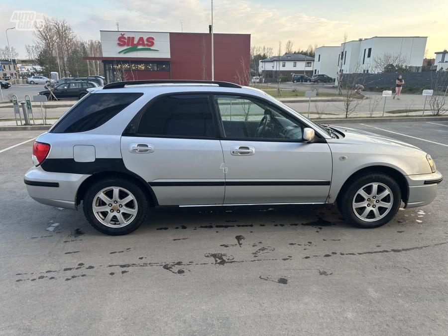 Grey Subaru Impreza 2003 in Vilnius, with an engine capacity of 2.00 L and mileage of 219 thousand km for 1400 €, photo 8 on AUTOMOTO.COM.LV