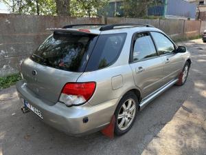 Grey Subaru Impreza 2005 in Bauska, with an engine capacity of 2.00 L and mileage of 298 thousand km for 2100 €, photo 3 on AUTOMOTO.COM.LV