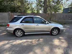 Grey Subaru Impreza 2005 in Bauska, with an engine capacity of 2.00 L and mileage of 298 thousand km for 2100 €, photo 8 on AUTOMOTO.COM.LV