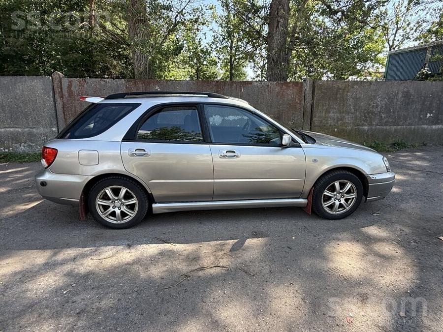 Grey Subaru Impreza 2005 in Bauska, with an engine capacity of 2.00 L and mileage of 298 thousand km for 2100 €, photo 8 on AUTOMOTO.COM.LV