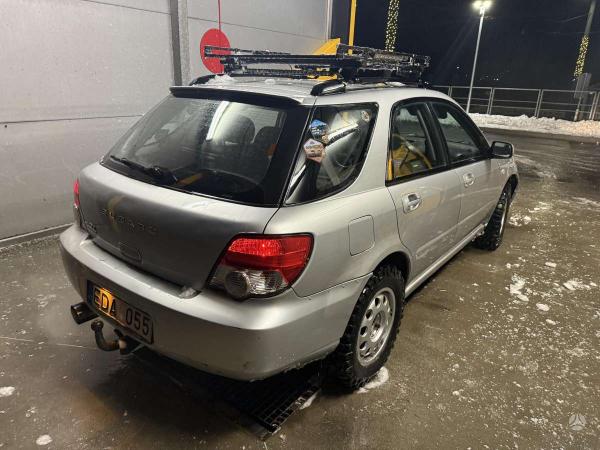 Grey Subaru Impreza 2005 in Kaunas, with an engine capacity of 2.00 L and mileage of 200 thousand km for 1950 €, photo 4 on AUTOMOTO.COM.LV
