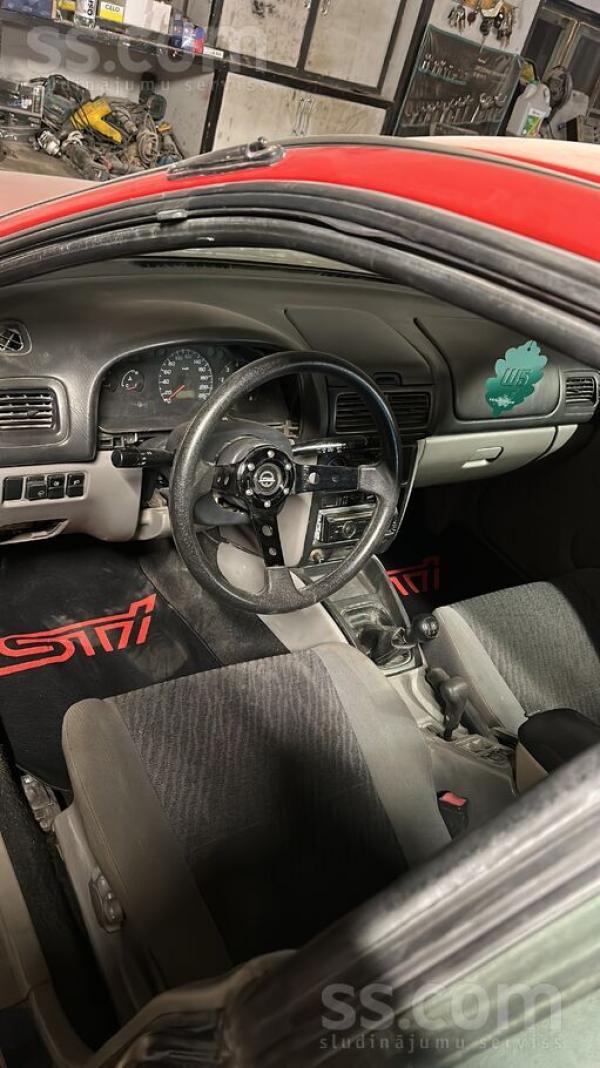 Sarkans Subaru Impreza 1999 Liepāja, ar dzinēja tilpumu 1.60 L un nobraukumu 330 tūkst. km par 2000 €, foto 3 vietnē AUTOMOTO.COM.LV