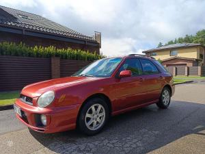 Sarkans Subaru Impreza 2001 Viļņa, ar dzinēja tilpumu 1.99 L un nobraukumu 350 tūkst. km par 1750 €, foto  vietnē AUTOMOTO.COM.LV