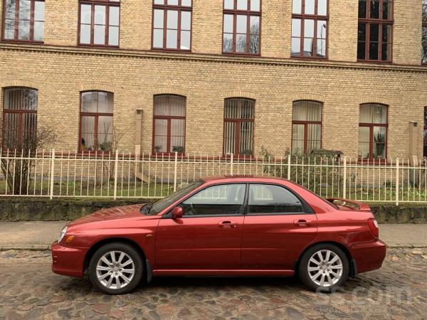 Red Subaru Impreza 2001 in Riga, with an engine capacity of 2.00 L and mileage of 277 thousand km for 3500 €, photo 1 on AUTOMOTO.COM.LV
