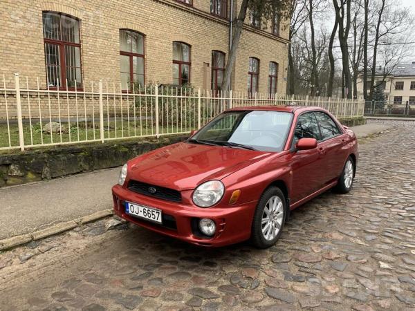Red Subaru Impreza 2001 in Riga, with an engine capacity of 2.00 L and mileage of 277 thousand km for 3500 €, photo 2 on AUTOMOTO.COM.LV