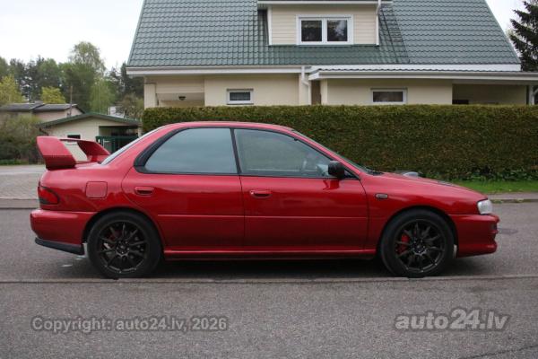 Red Subaru Impreza 2001 in Tallinn, with an engine capacity of 2.00 L and mileage of 298 thousand km for 12500 €, photo 3 on AUTOMOTO.COM.LV