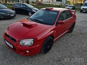 Sarkans Subaru Impreza 2003 Liepāja, ar dzinēja tilpumu 2.00 L un nobraukumu 165 tūkst. km par 7900 €, foto  vietnē AUTOMOTO.COM.LV