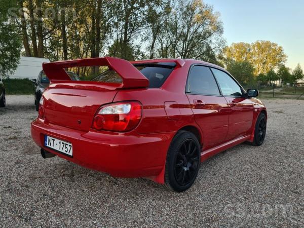 Red Subaru Impreza 2003 in Liepaja, with an engine capacity of 2.00 L and mileage of 165 thousand km for 7900 €, photo 5 on AUTOMOTO.COM.LV