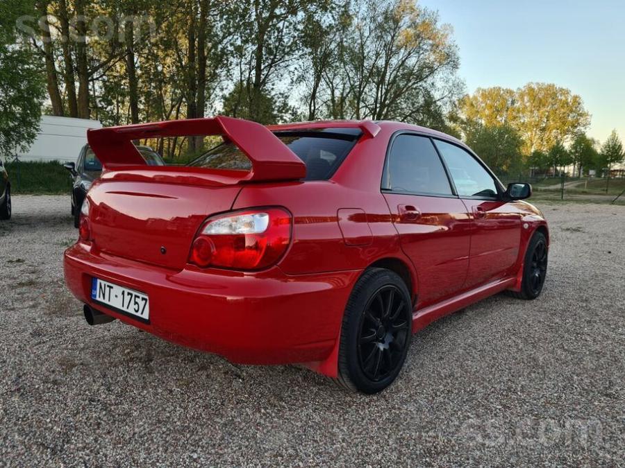 Sarkans Subaru Impreza 2003 Liepāja, ar dzinēja tilpumu 2.00 L un nobraukumu 165 tūkst. km par 7900 €, foto 5 vietnē AUTOMOTO.COM.LV