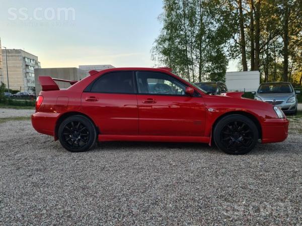 Red Subaru Impreza 2003 in Liepaja, with an engine capacity of 2.00 L and mileage of 165 thousand km for 7900 €, photo 6 on AUTOMOTO.COM.LV