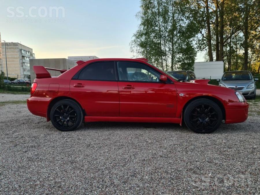 Sarkans Subaru Impreza 2003 Liepāja, ar dzinēja tilpumu 2.00 L un nobraukumu 165 tūkst. km par 7900 €, foto 6 vietnē AUTOMOTO.COM.LV