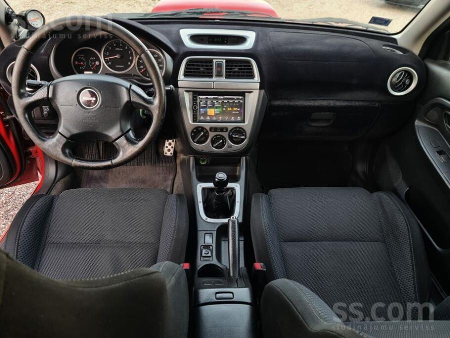 Sarkans Subaru Impreza 2003 Liepāja, ar dzinēja tilpumu 2.00 L un nobraukumu 165 tūkst. km par 7900 €, foto 8 vietnē AUTOMOTO.COM.LV