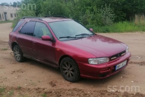 Красный Субару Импреза 1999 в Лудза, объемом двигателя 2.00 л и пробегом 391 тыс. км за 750 €, фото 1 на AUTOMOTO.COM.LV