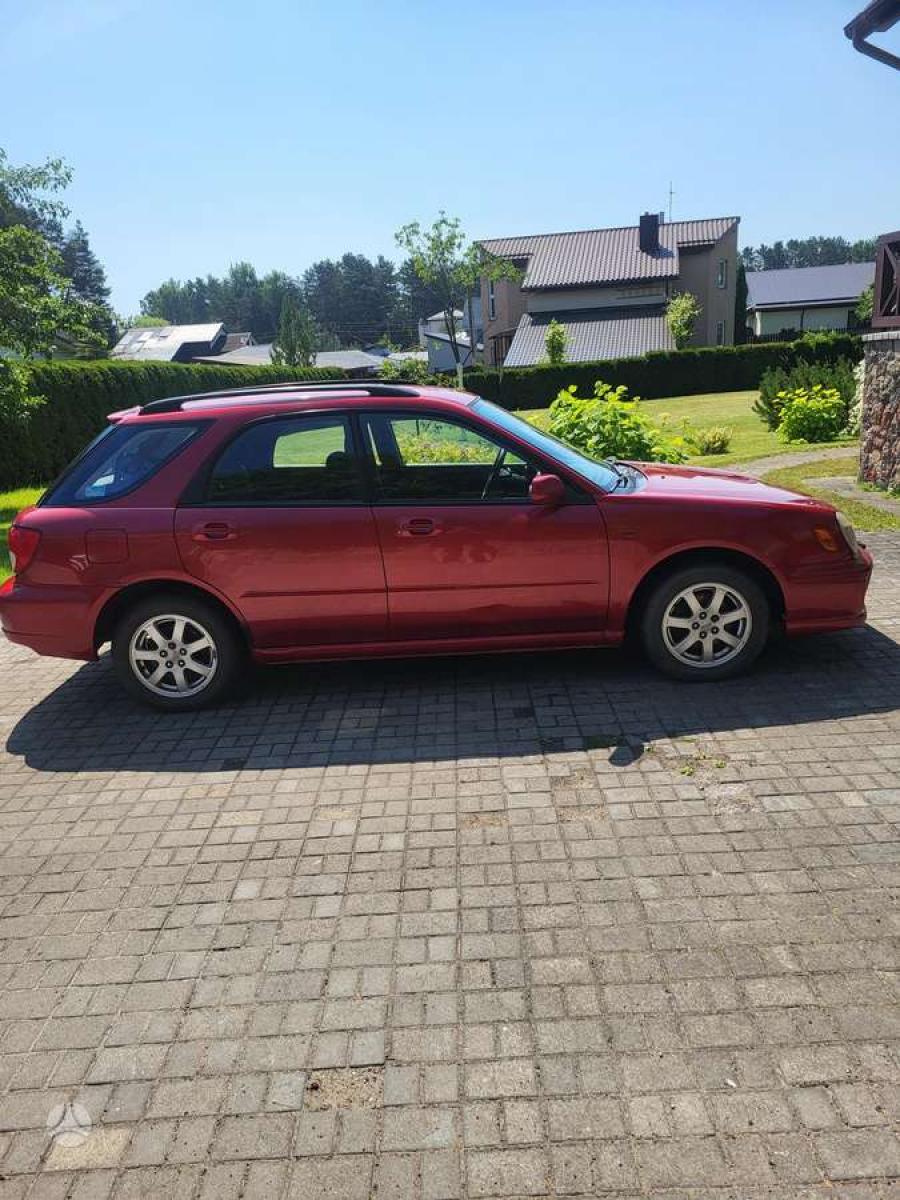 Red Subaru Impreza 2000 in Vilnius, with an engine capacity of 1.99 L and mileage of 177 thousand km for 1599 €, photo 4 on AUTOMOTO.COM.LV
