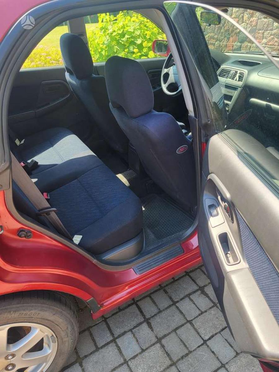 Red Subaru Impreza 2000 in Vilnius, with an engine capacity of 1.99 L and mileage of 177 thousand km for 1599 €, photo 6 on AUTOMOTO.COM.LV