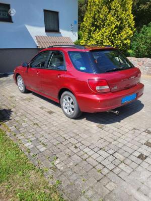 Red Subaru Impreza 2000 in Vilnius, with an engine capacity of 1.99 L and mileage of 177 thousand km for 1599 €, photo 8 on AUTOMOTO.COM.LV