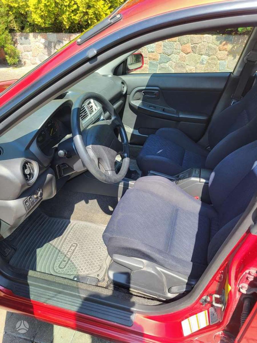 Red Subaru Impreza 2000 in Vilnius, with an engine capacity of 1.99 L and mileage of 177 thousand km for 1599 €, photo 9 on AUTOMOTO.COM.LV
