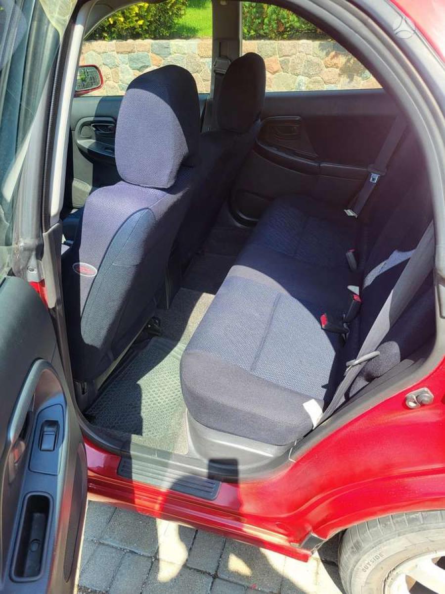 Red Subaru Impreza 2000 in Vilnius, with an engine capacity of 1.99 L and mileage of 177 thousand km for 1599 €, photo 10 on AUTOMOTO.COM.LV