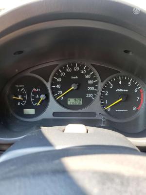 Red Subaru Impreza 2000 in Vilnius, with an engine capacity of 1.99 L and mileage of 177 thousand km for 1599 €, photo 13 on AUTOMOTO.COM.LV