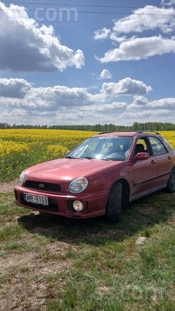 Red Subaru Impreza 2002 in Preili, with an engine capacity of 2.00 L and mileage of 356 thousand km for 1150 €, photo 1 on AUTOMOTO.COM.LV