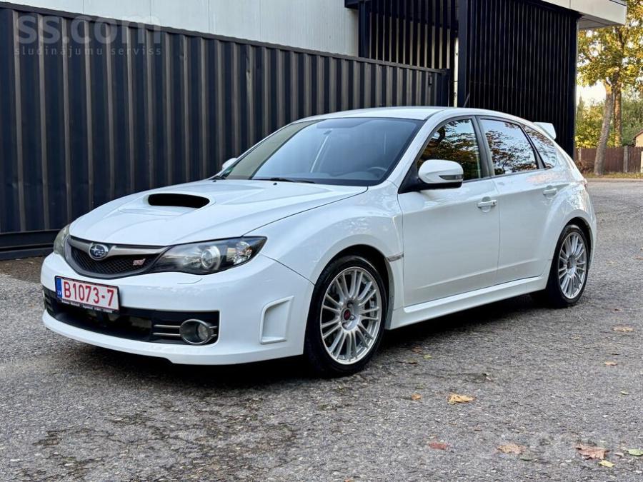 White Subaru Impreza 2009 in Riga, with an engine capacity of 2.50 L and mileage of 227 thousand km for 15500 €, photo 1 on AUTOMOTO.COM.LV