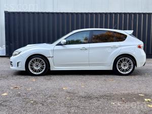 White Subaru Impreza 2009 in Riga, with an engine capacity of 2.50 L and mileage of 227 thousand km for 15500 €, photo 3 on AUTOMOTO.COM.LV