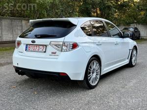 White Subaru Impreza 2009 in Riga, with an engine capacity of 2.50 L and mileage of 227 thousand km for 15500 €, photo 6 on AUTOMOTO.COM.LV