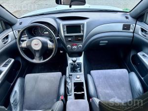 White Subaru Impreza 2009 in Riga, with an engine capacity of 2.50 L and mileage of 227 thousand km for 15500 €, photo 9 on AUTOMOTO.COM.LV