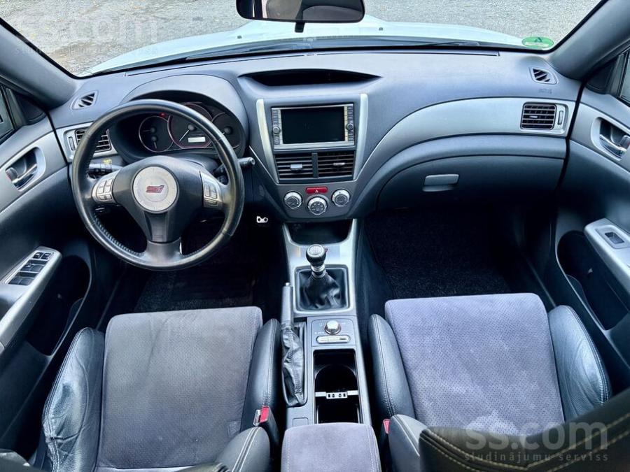 White Subaru Impreza 2009 in Riga, with an engine capacity of 2.50 L and mileage of 227 thousand km for 15500 €, photo 9 on AUTOMOTO.COM.LV