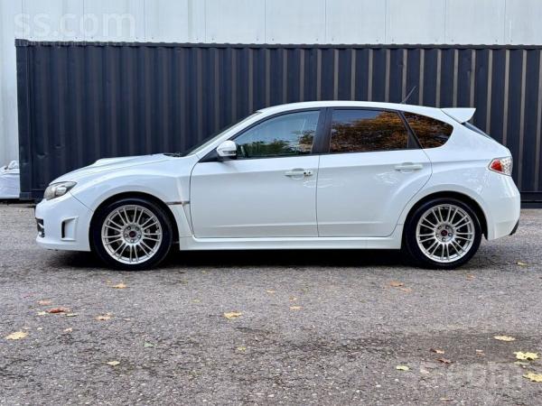Subaru Impreza 2009 Rīga vietnē Balts Subaru Impreza 2009 Rīga, ar dzinēja tilpumu 2.50 L un nobraukumu 227 tūkst. km par 15500 €, foto 3 vietnē AUTOMOTO.COM.LV