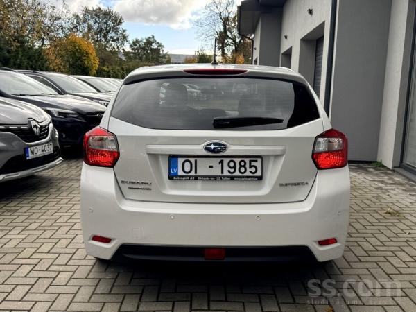 White Subaru Impreza 2013 in Riga, with an engine capacity of 1.60 L and mileage of 189 thousand km for 7300 €, photo 5 on AUTOMOTO.COM.LV