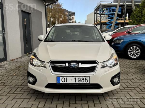 White Subaru Impreza 2013 in Riga, with an engine capacity of 1.60 L and mileage of 189 thousand km for 7300 €, photo 6 on AUTOMOTO.COM.LV