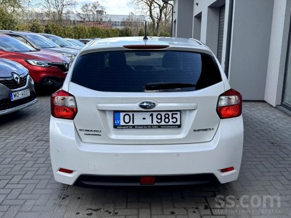 Balts Subaru Impreza 2013 Rīga, ar dzinēja tilpumu 1.60 L un nobraukumu 189 tūkst. km par 6700 €, foto 5 vietnē AUTOMOTO.COM.LV