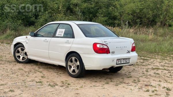 Balts Subaru Impreza 2004 Rīga, ar dzinēja tilpumu 2.00 L un nobraukumu 236 tūkst. km par 2000 €, foto 3 vietnē AUTOMOTO.COM.LV
