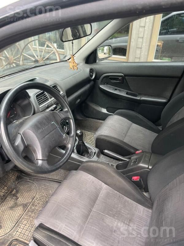 Balts Subaru Impreza 2004 Rīga, ar dzinēja tilpumu 2.00 L un nobraukumu 236 tūkst. km par 2000 €, foto 6 vietnē AUTOMOTO.COM.LV