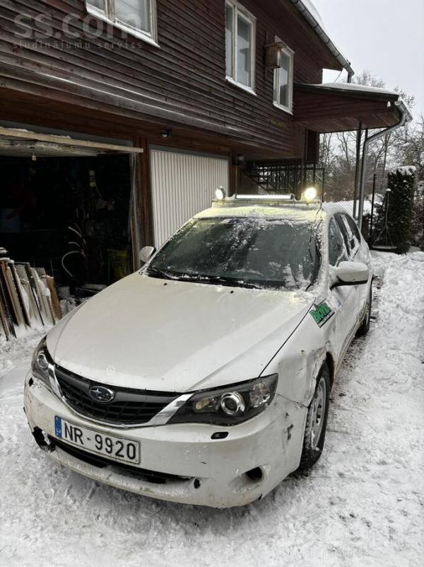 White Subaru Impreza 2008 in Riga, with an engine capacity of 2.00 L and mileage of 180 thousand km for 1500 €, photo 4 on AUTOMOTO.COM.LV