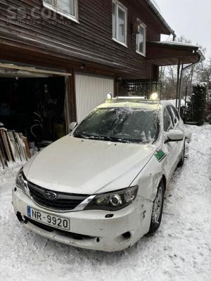 White Subaru Impreza 2008 in Riga, with an engine capacity of 2.00 L and mileage of 180 thousand km for 1500 €, photo 4 on AUTOMOTO.COM.LV