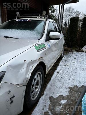 White Subaru Impreza 2008 in Riga, with an engine capacity of 2.00 L and mileage of 180 thousand km for 1500 €, photo 7 on AUTOMOTO.COM.LV