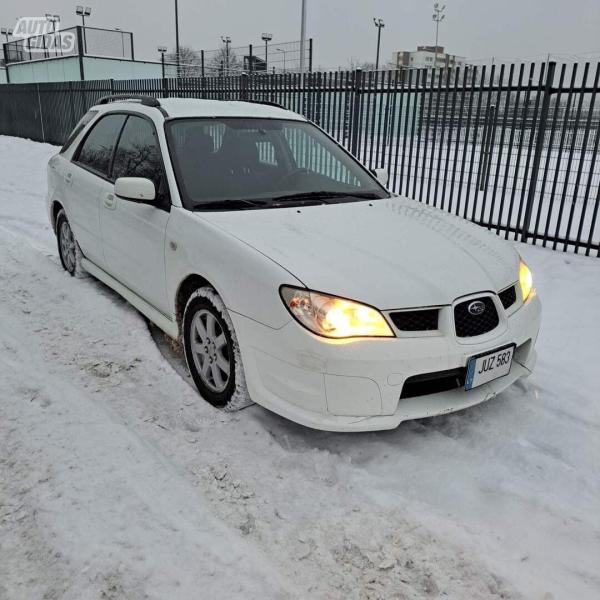 White Subaru Impreza 2006 in Jonava, with an engine capacity of 1.50 L and mileage of 249 thousand km for 1800 €, photo 4 on AUTOMOTO.COM.LV