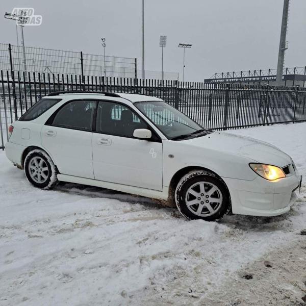White Subaru Impreza 2006 in Jonava, with an engine capacity of 1.50 L and mileage of 249 thousand km for 1800 €, photo 6 on AUTOMOTO.COM.LV