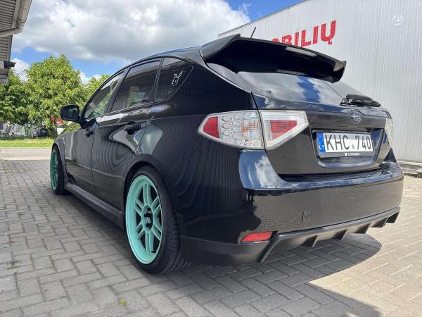 Black Subaru Impreza WRX 2007 in Kaunas, with an engine capacity of 2.46 L and mileage of 320 thousand km for 6500 €, photo 2 on AUTOMOTO.COM.LV