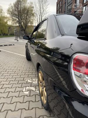 Black Subaru Impreza WRX 2006 in Klaipeda, with an engine capacity of 2.50 L and mileage of 280 thousand km for 6200 €, photo 8 on AUTOMOTO.COM.LV