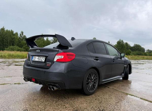 Черный Субару Impreza WRX 2015 в Рига, объемом двигателя 2.50 л и пробегом 150 тыс. км за 22000 €, фото 2 на AUTOMOTO.COM.LV