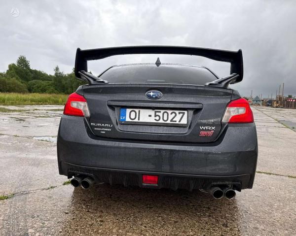 Черный Субару Impreza WRX 2015 в Рига, объемом двигателя 2.50 л и пробегом 150 тыс. км за 22000 €, фото 3 на AUTOMOTO.COM.LV