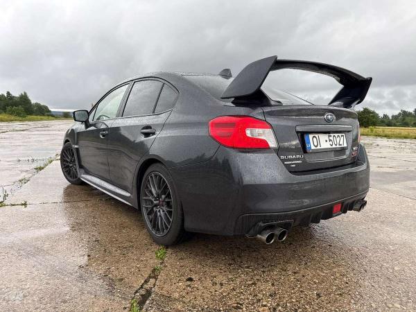 Черный Субару Impreza WRX 2015 в Рига, объемом двигателя 2.50 л и пробегом 150 тыс. км за 22000 €, фото 4 на AUTOMOTO.COM.LV