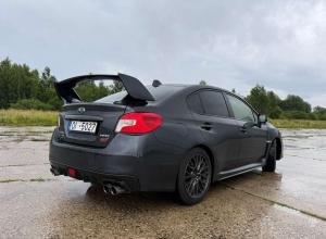 Black Subaru Impreza WRX 2015 in Riga, with an engine capacity of 2.50 L and mileage of 150 thousand km for 22000 €, photo 3 on AUTOMOTO.COM.LV