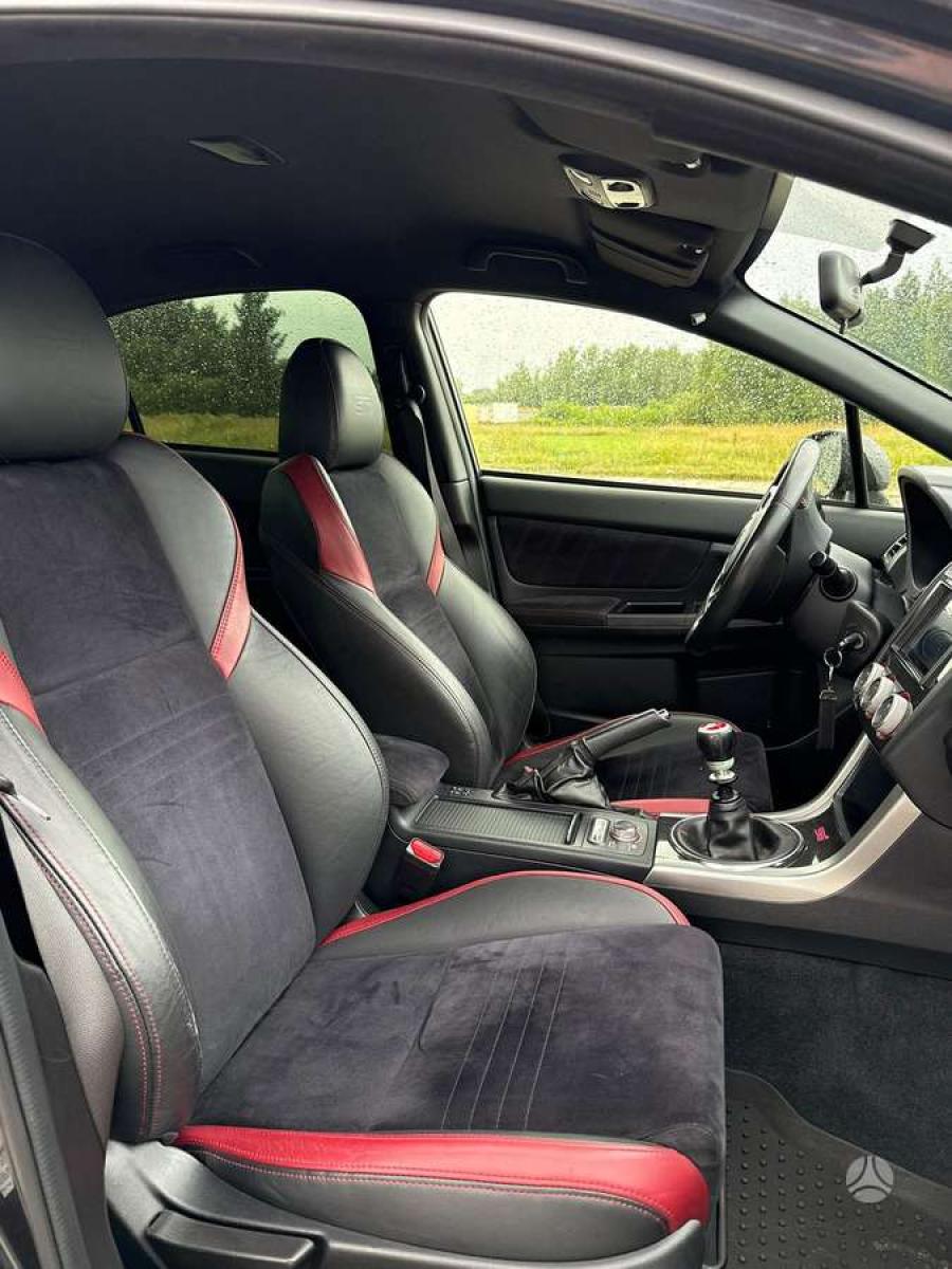 Black Subaru Impreza WRX 2015 in Riga, with an engine capacity of 2.50 L and mileage of 150 thousand km for 22000 €, photo 9 on AUTOMOTO.COM.LV